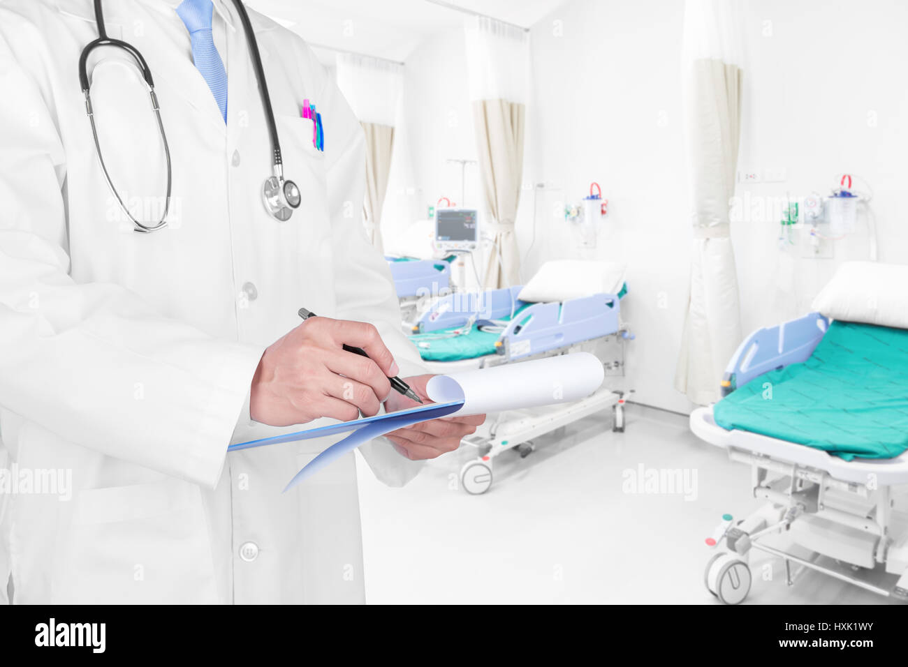 Doctor writing a medical prescription with medical background Stock ...