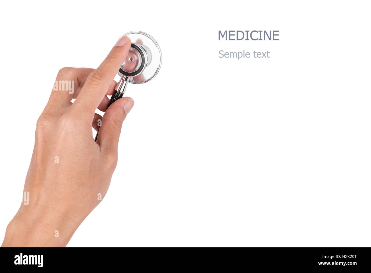 Hand holding a stethoscope isolated on white background with clipping ...