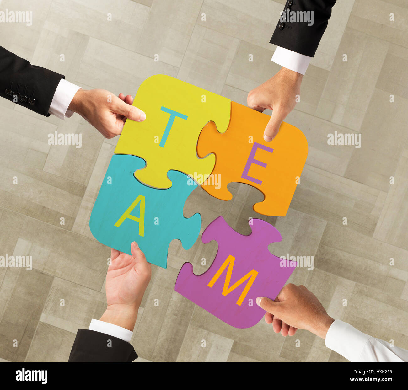 Team work for one goal Stock Photo - Alamy