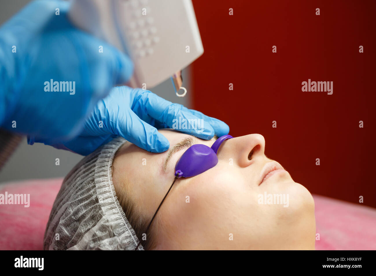 Laser removal of tattoo eyebrows. Shooting closeups. Cosmetic medical ...