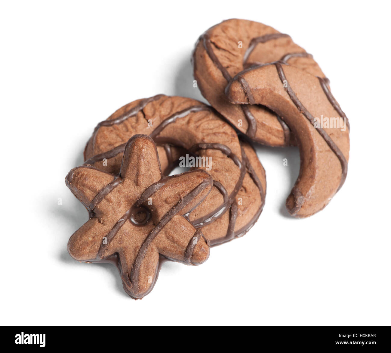 Heap of chocolate cookies in different shape isolated on white ...