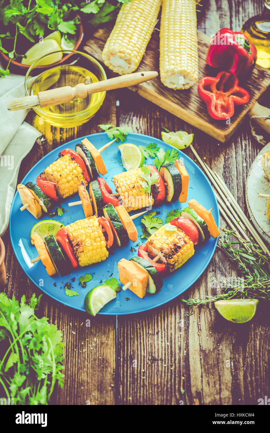 bbq garden picnic healthy food spread on table with herbs and ...