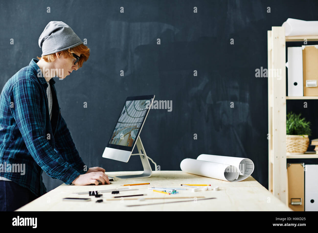 Contemporary Young Engineer at Workplace Stock Photo - Alamy