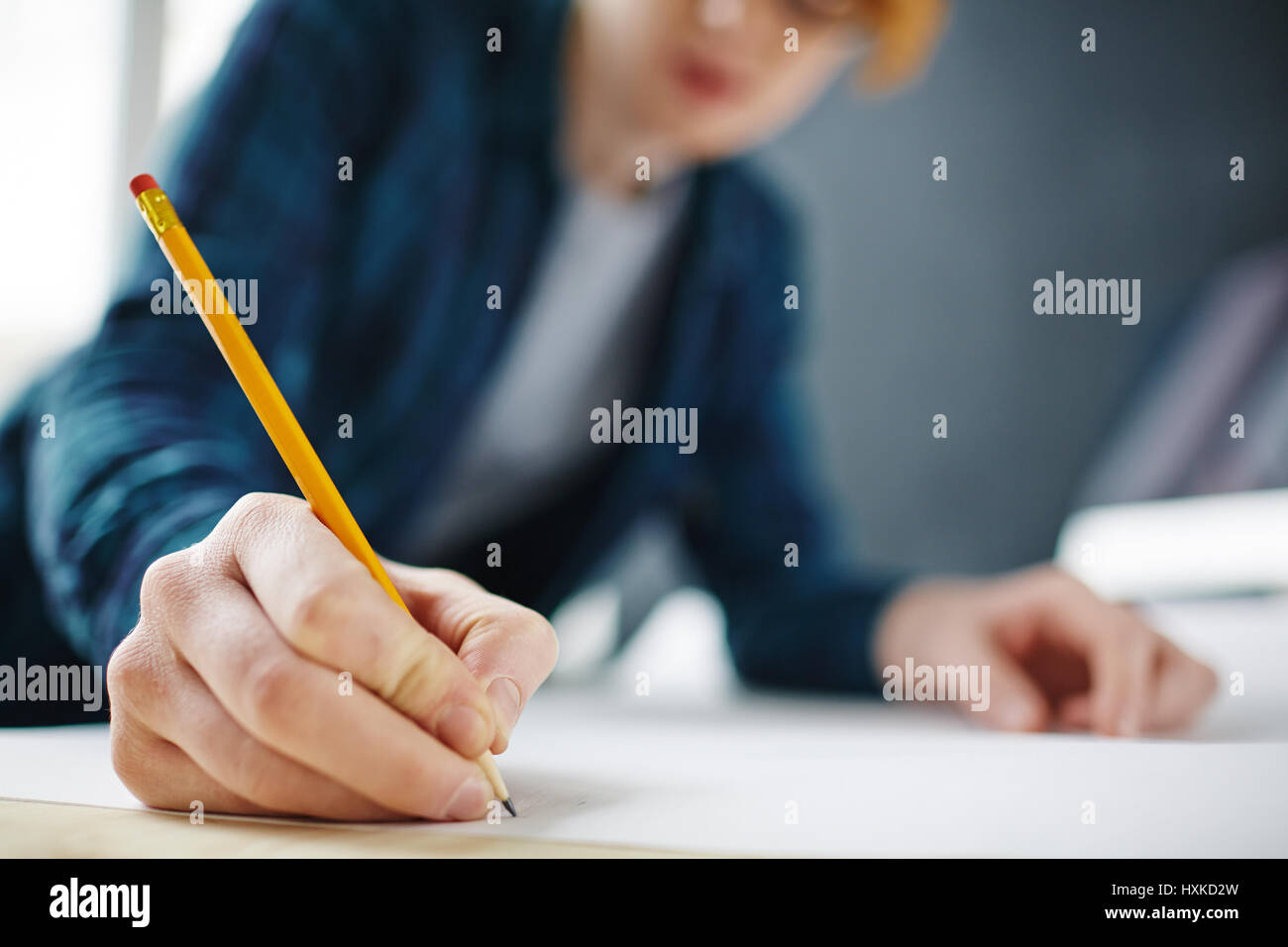 Closeup Hand Drawing with Pencil Stock Photo - Alamy