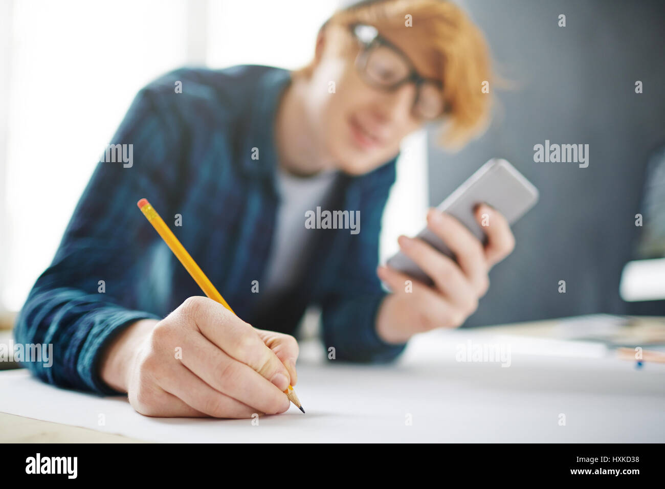 Creative Young Man Working Stock Photo - Alamy
