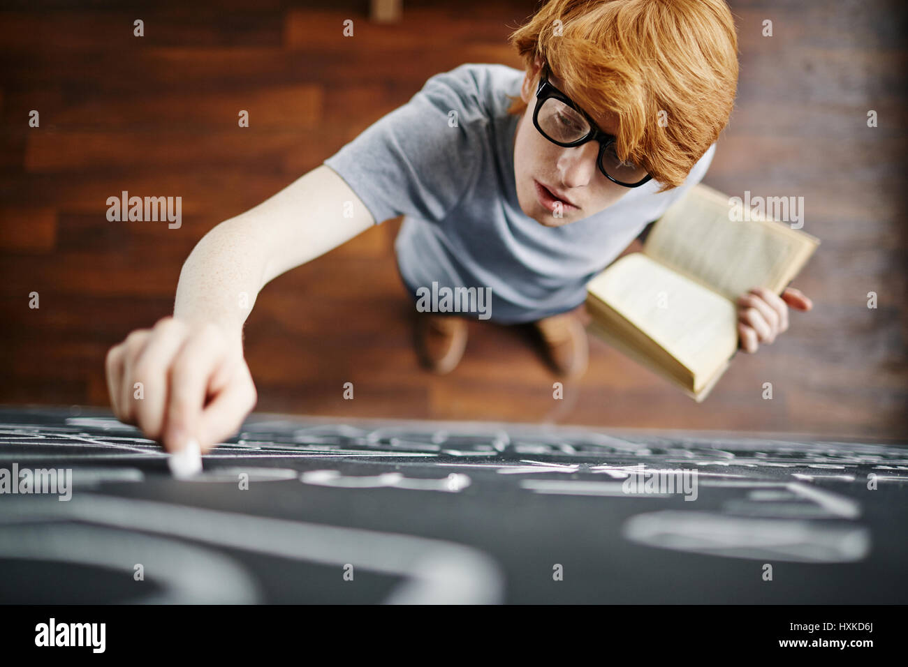 Man writing formula board hi-res stock photography and images - Alamy