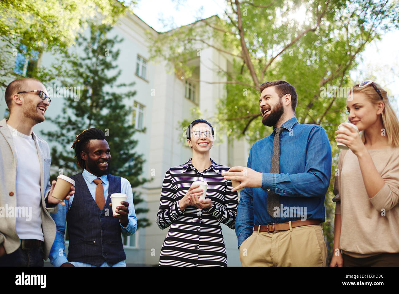 Spending coffee break outdoors Stock Photo - Alamy