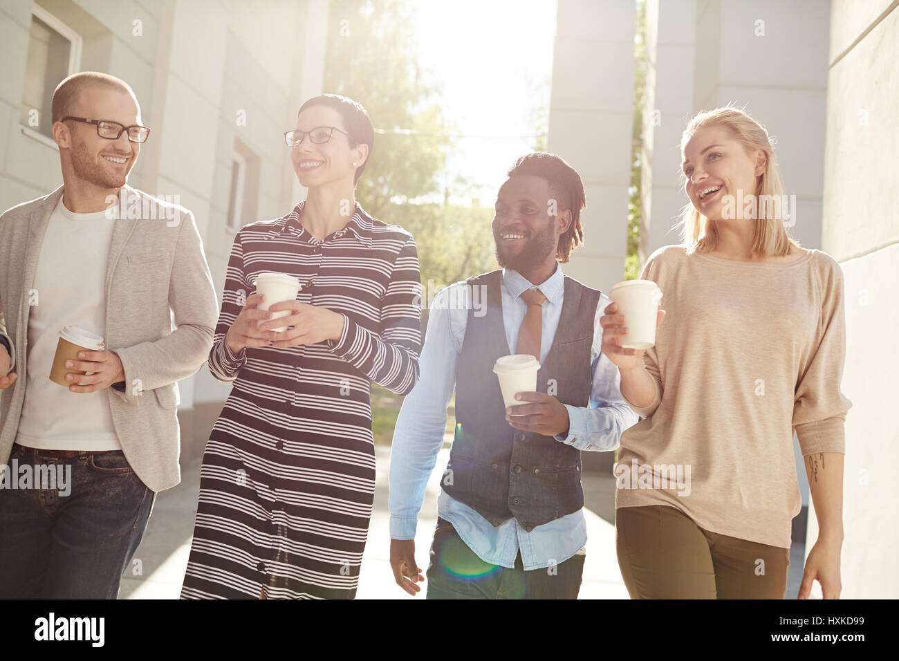 Pleasant walk with colleagues Stock Photo - Alamy