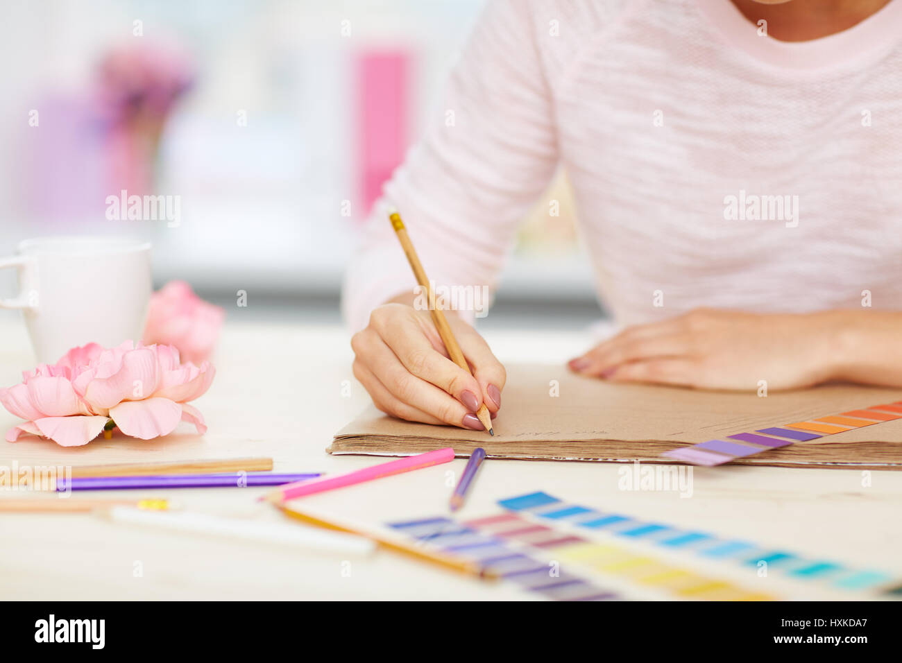 Female hands notebook pencil hi-res stock photography and images - Alamy