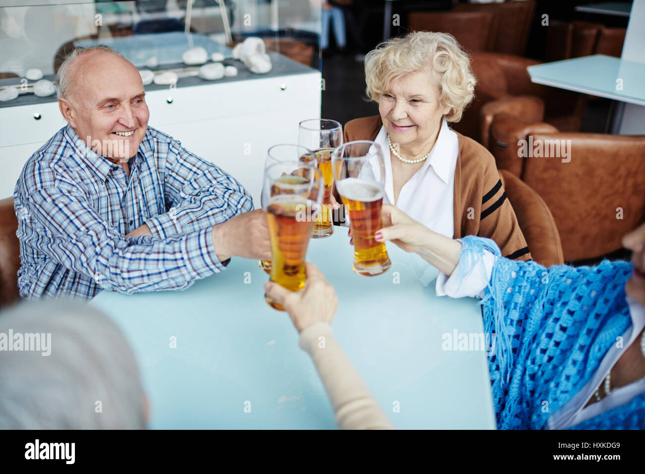 Senior people gathered in pub Stock Photo - Alamy