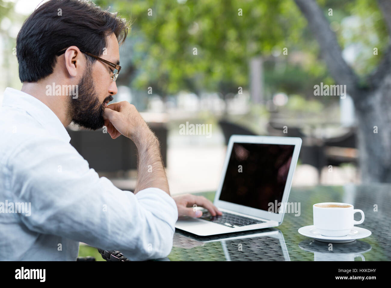 Having coffee break in outdoor cafe Stock Photo - Alamy