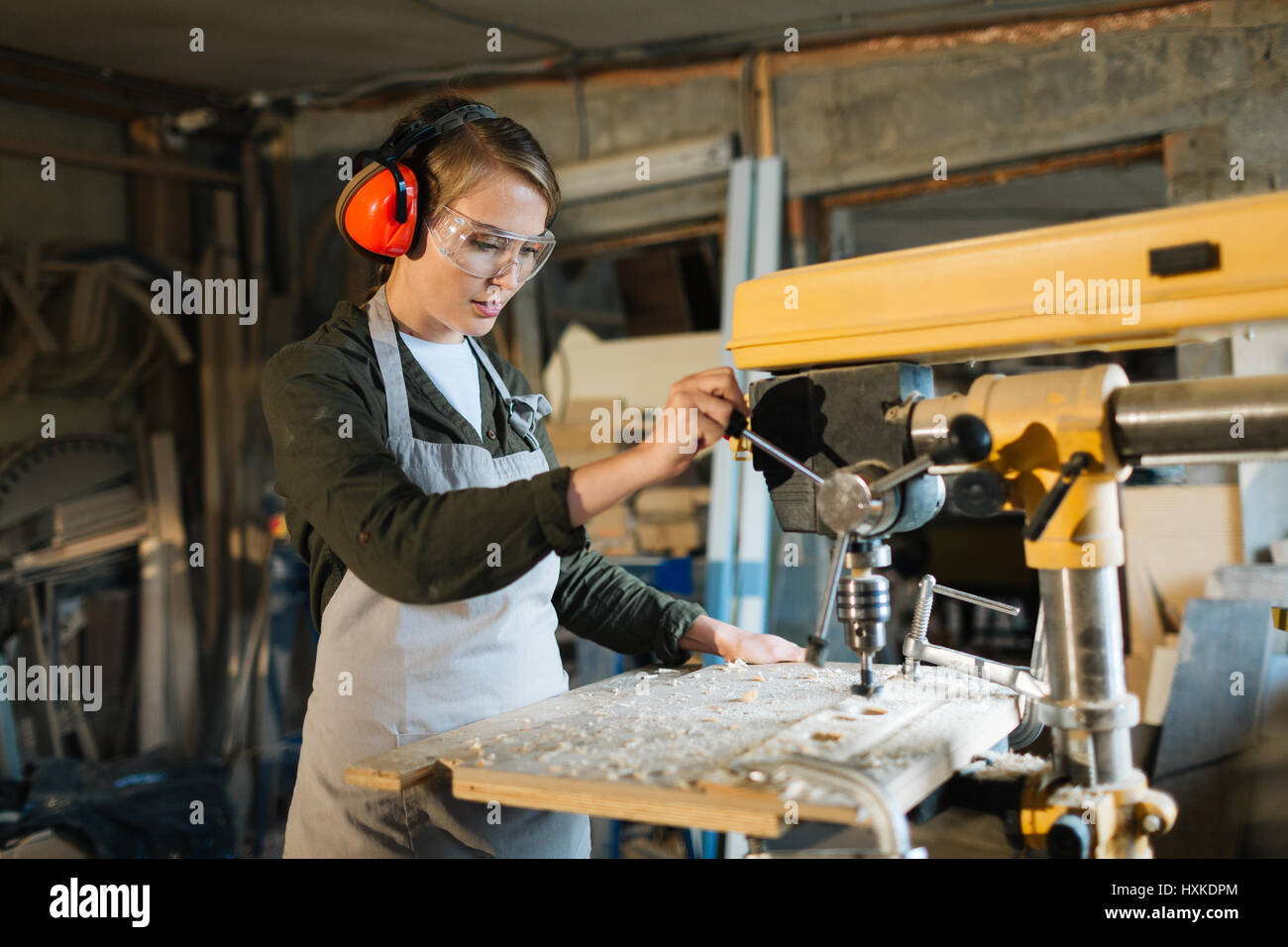 Pretty carpenter using drill hi-res stock photography and images - Alamy