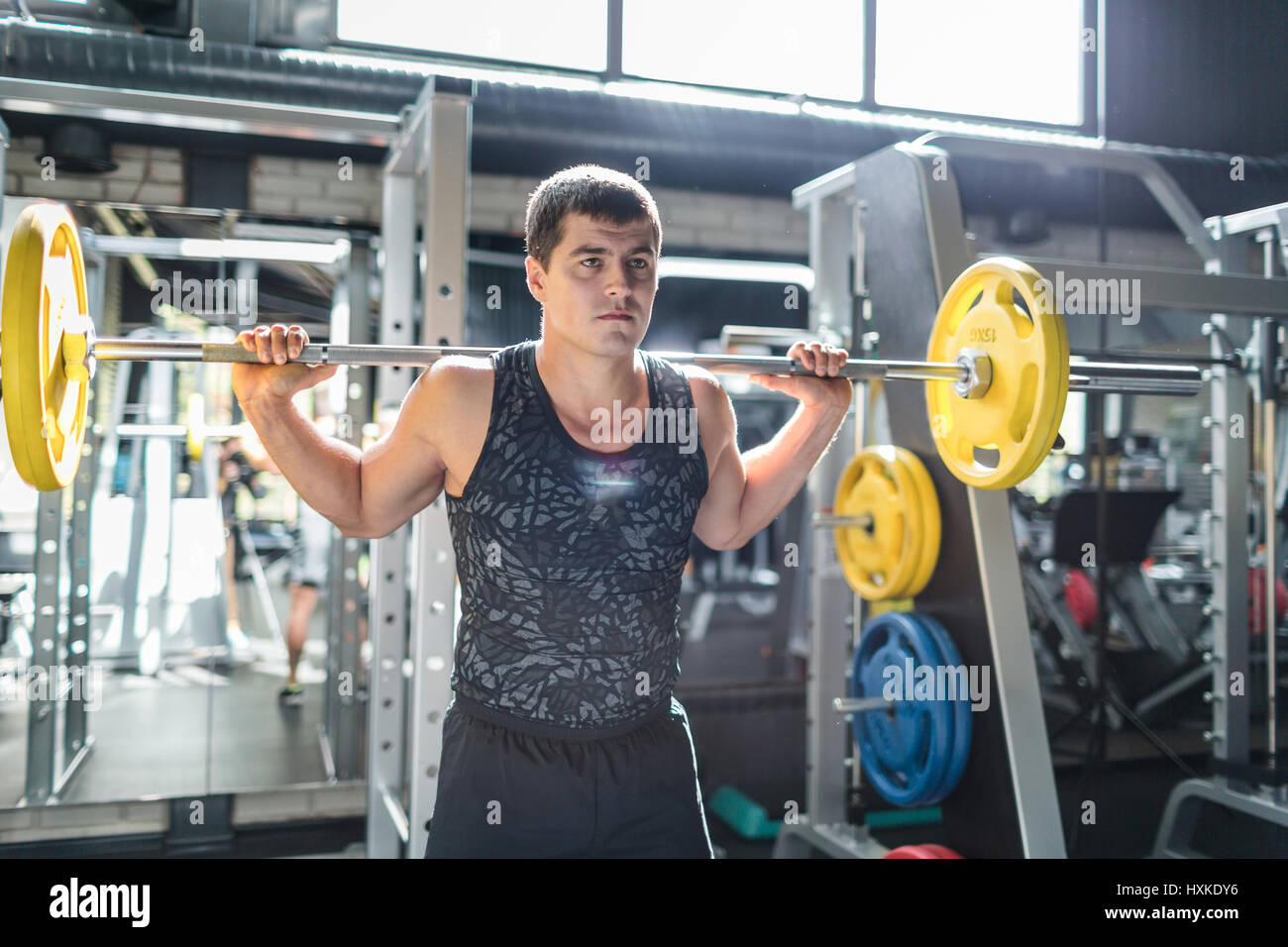Muscular Athlete Weightlifting in Gym Stock Photo - Alamy