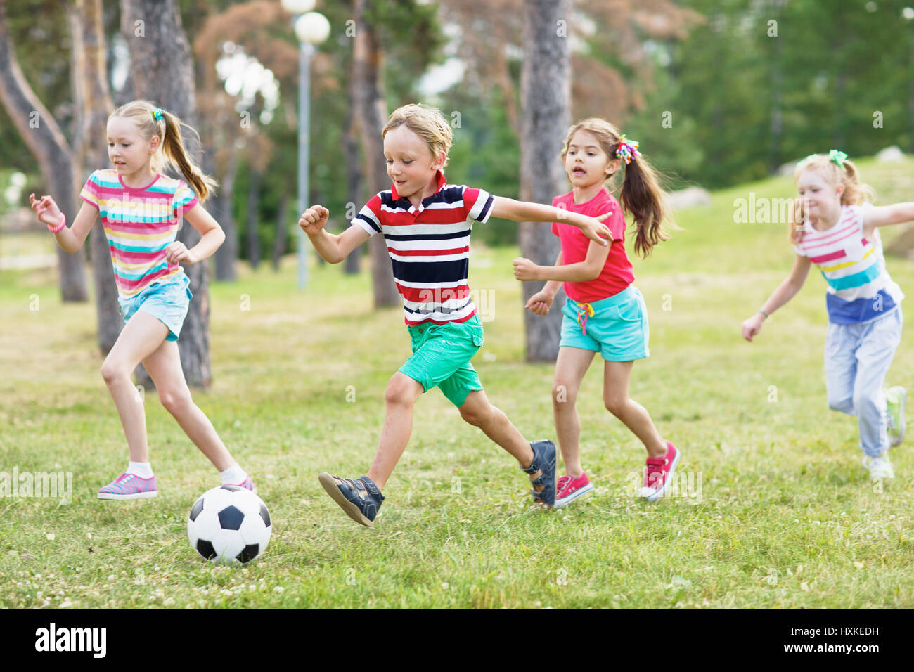 Children playing with ball Stock Photo - Alamy