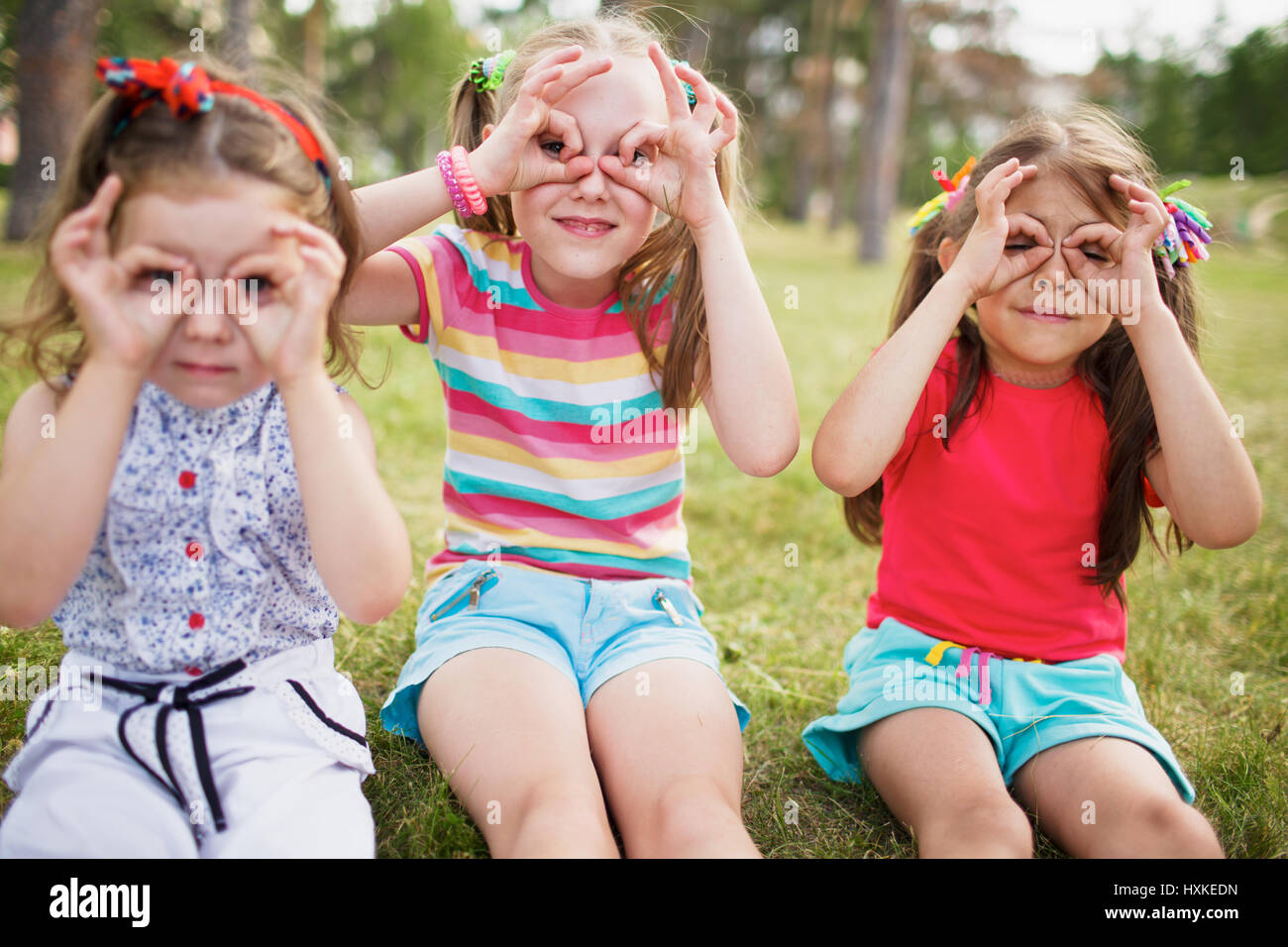 Girls fooling in park Stock Photo - Alamy