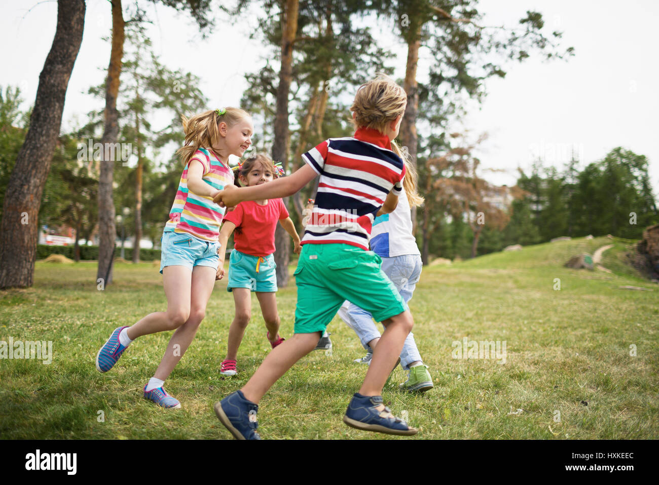 Children playing outdoors Stock Photo - Alamy