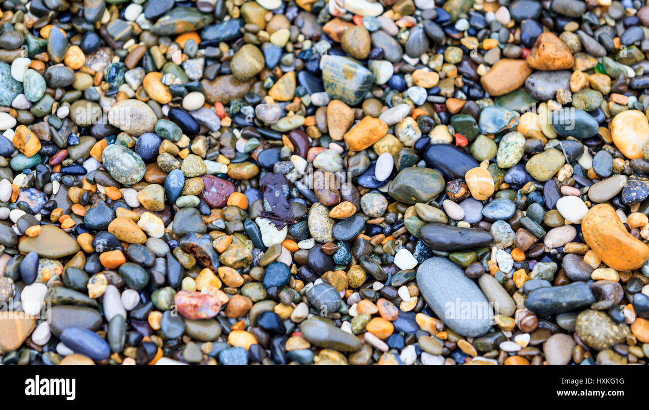 stones on the beach. stone background Stock Photo - Alamy