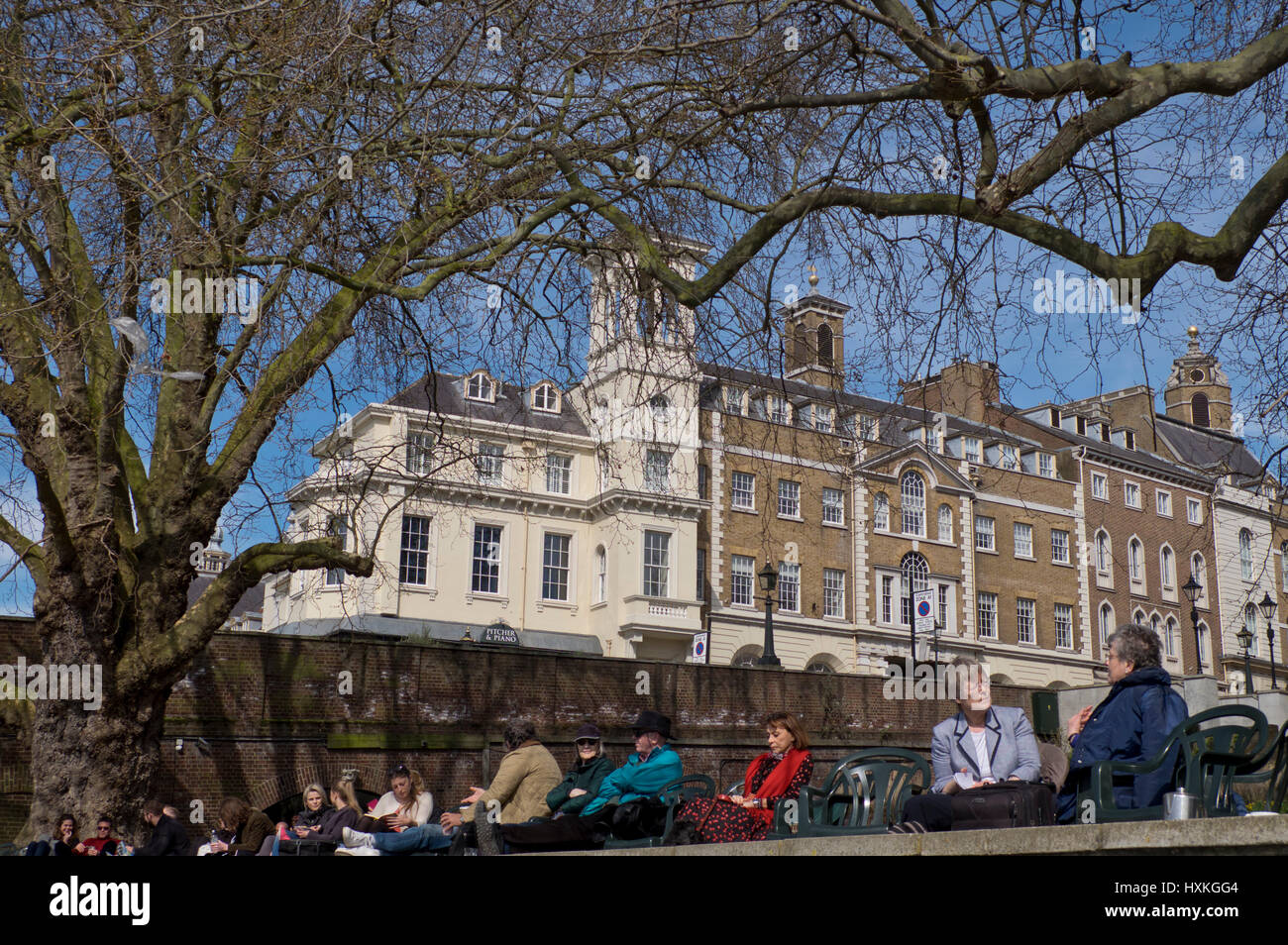 People enjoying the sun on Richmond park by river Thames on the first ...