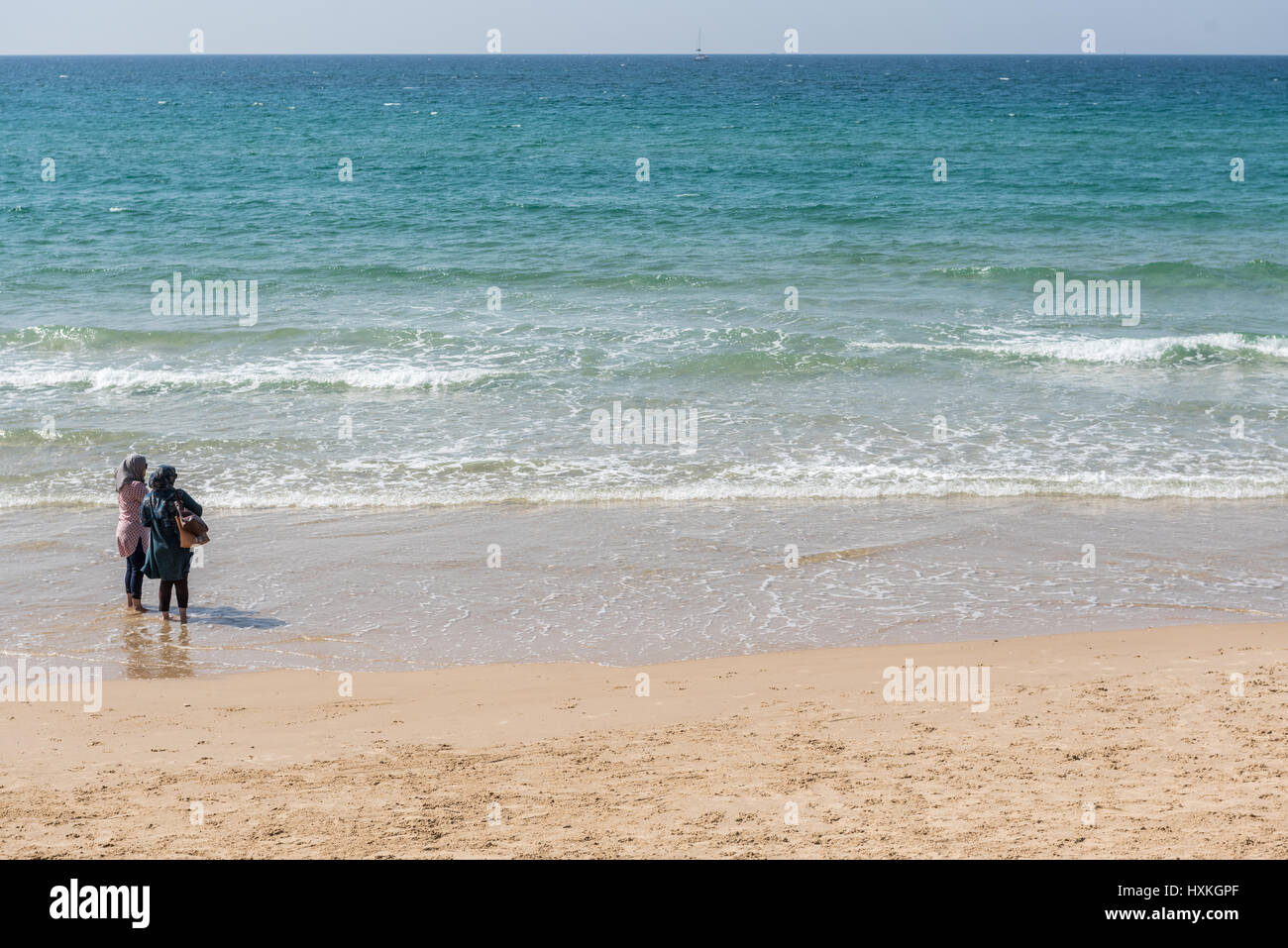 Muslim women wearing a headscarf - hijab, in the sea, Tel Aviv-Yafo ...