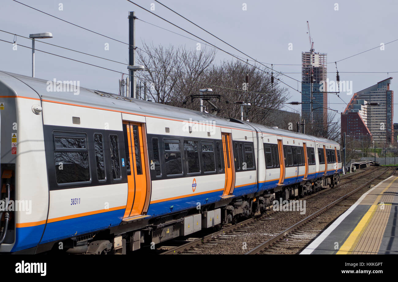 Train at Overground station at Hackney Wick with views of QEII Olympic ...