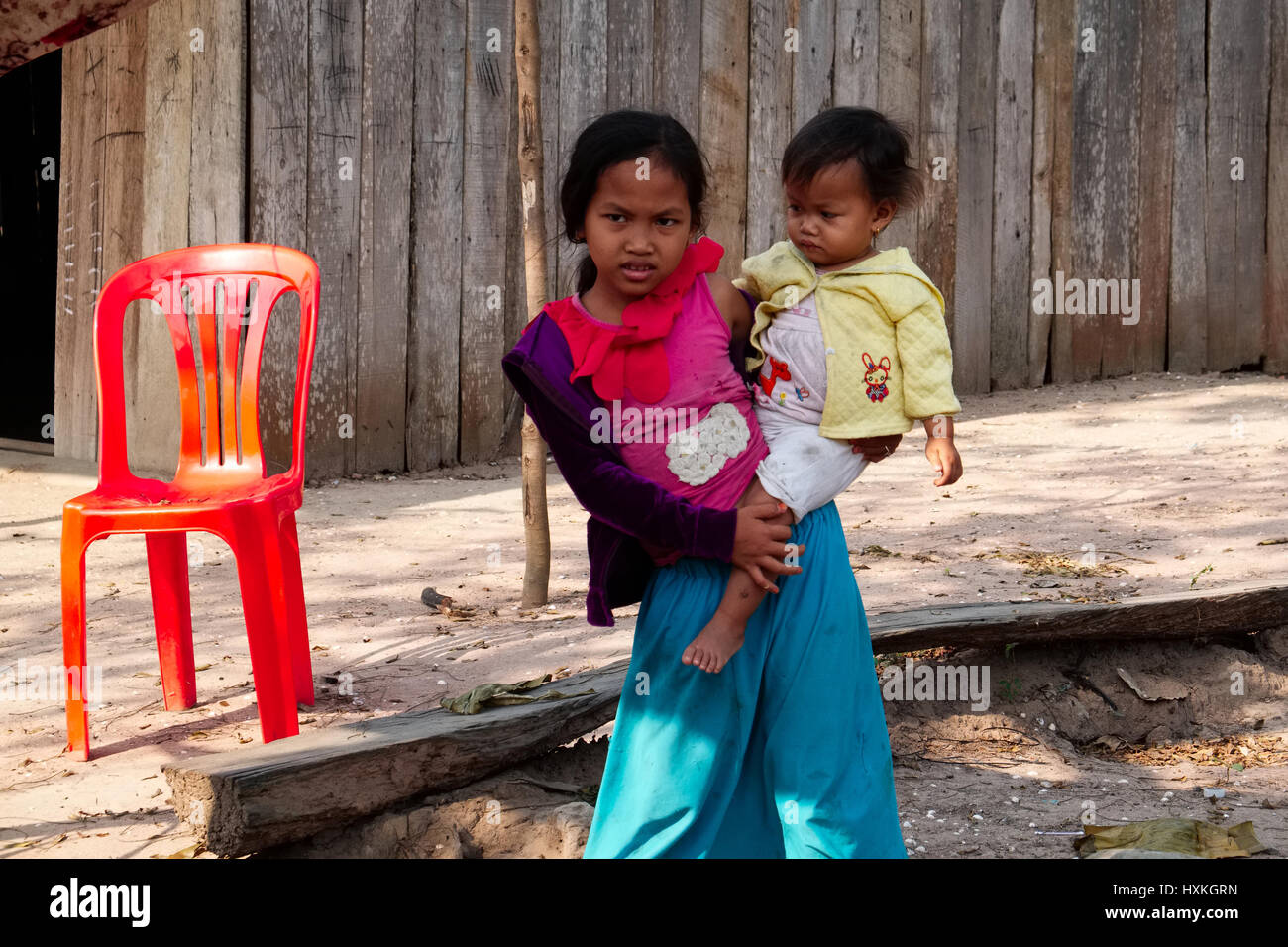 Girl with child Stock Photo - Alamy