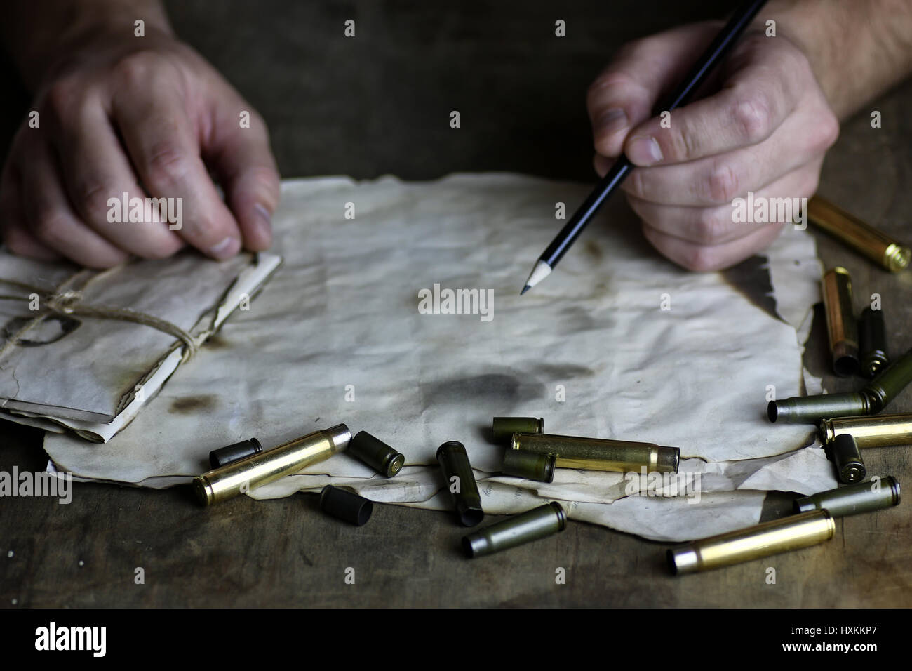 man write letter retro bullet on the table Stock Photo - Alamy