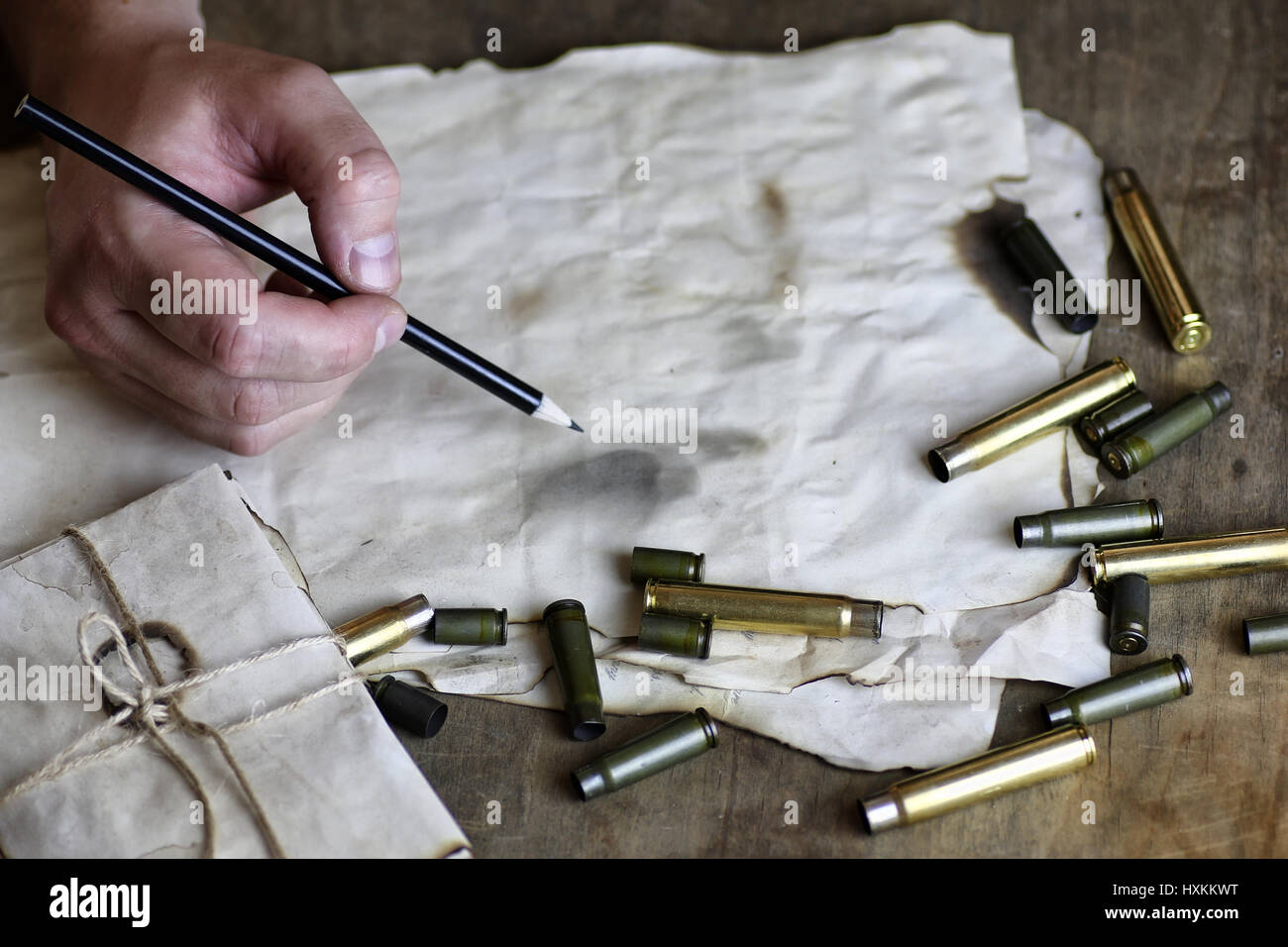 man write letter retro bullet on the table Stock Photo - Alamy