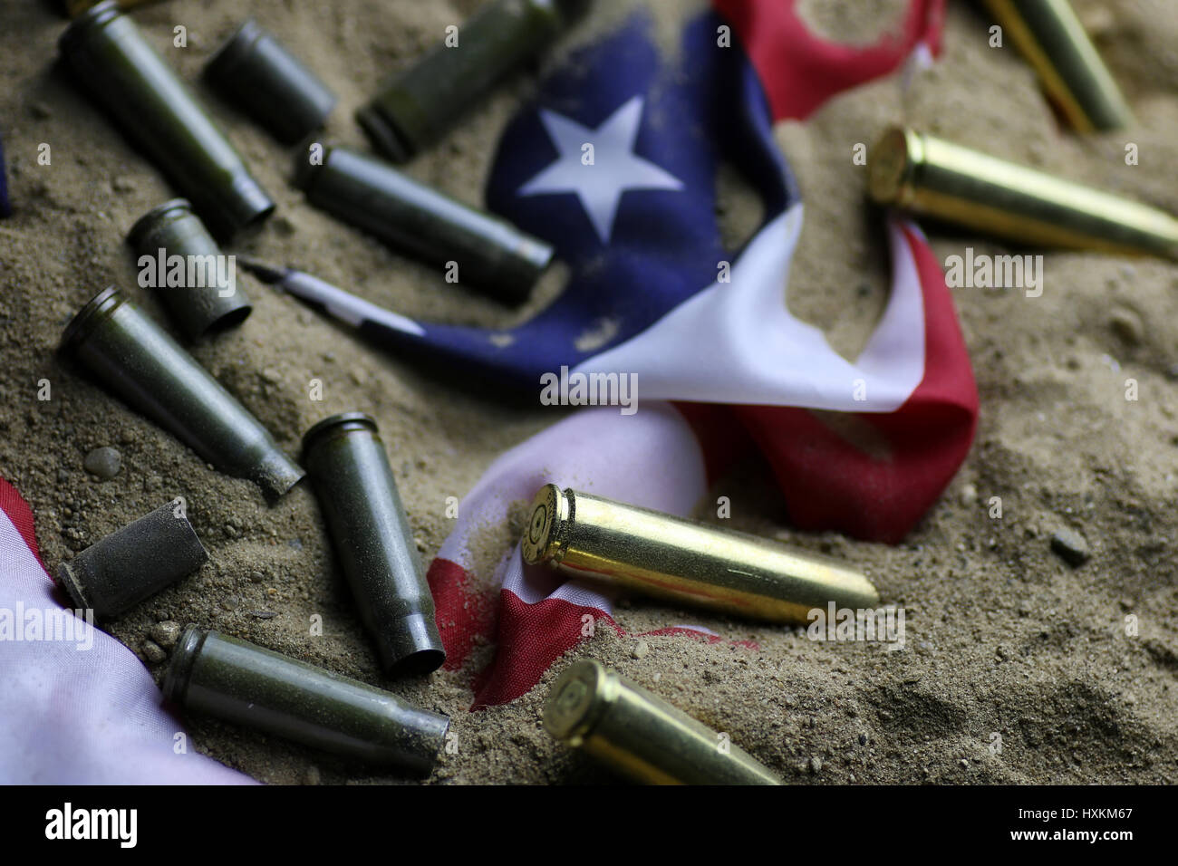bullet and usa flag in the sand war Stock Photo - Alamy