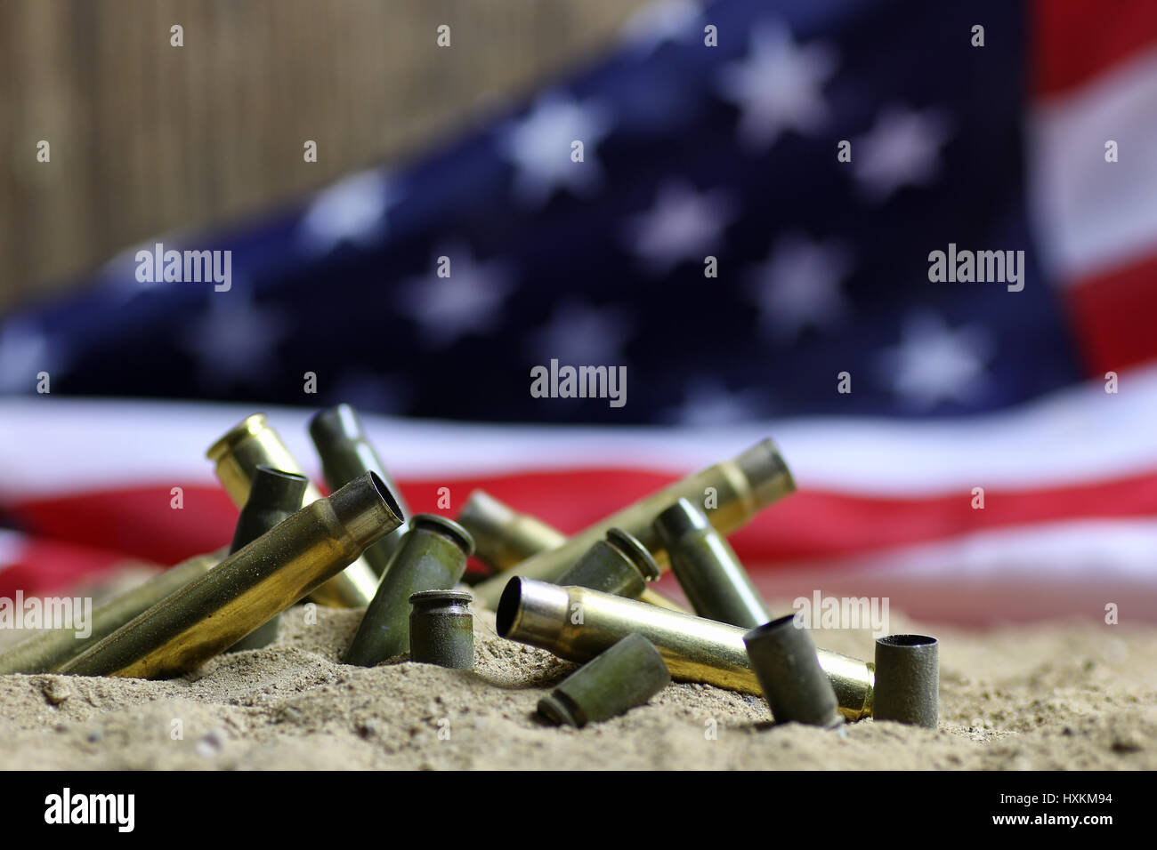 bullet and usa flag in the sand war Stock Photo - Alamy