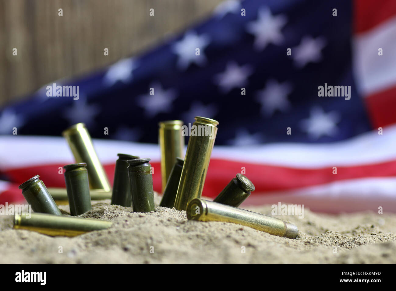 bullet and usa flag in the sand war Stock Photo - Alamy