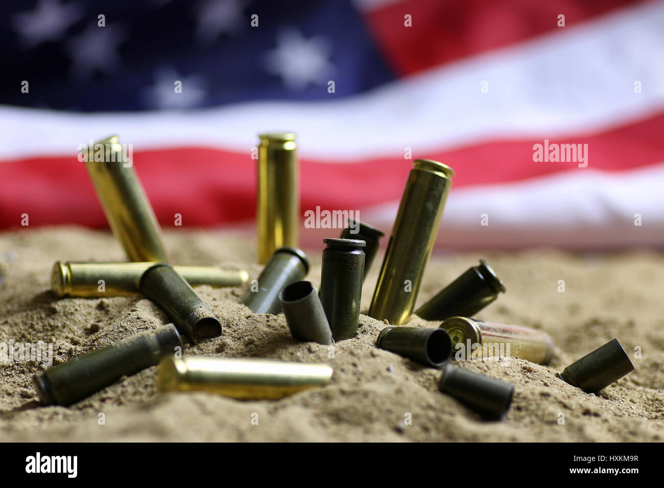 bullet and usa flag in the sand war Stock Photo - Alamy