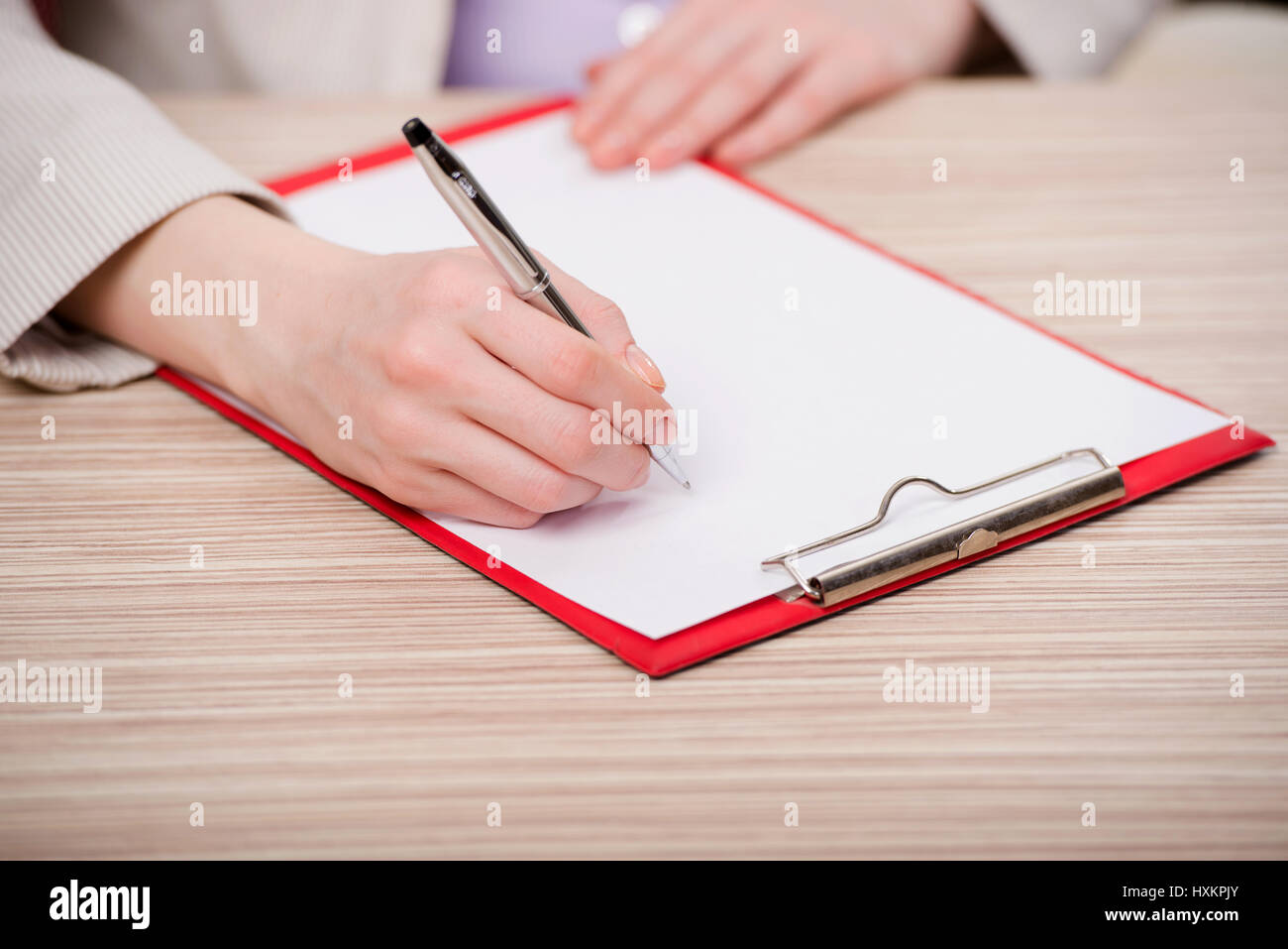 Hands taking notes in the pad Stock Photo - Alamy