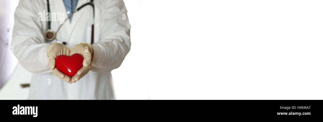 heart in doctor hand Stock Photo - Alamy