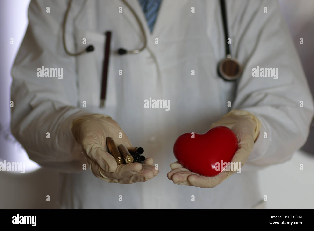 heart and sleeve in doctor hand Stock Photo - Alamy