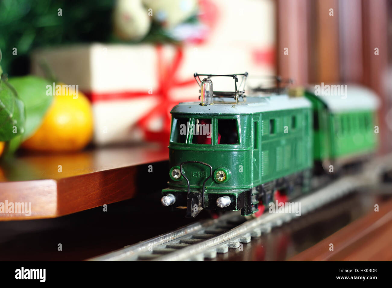 train under tree gift Stock Photo - Alamy