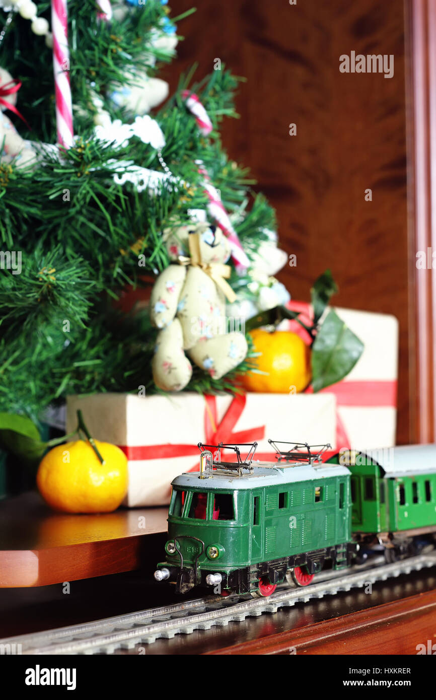 train under tree gift Stock Photo - Alamy
