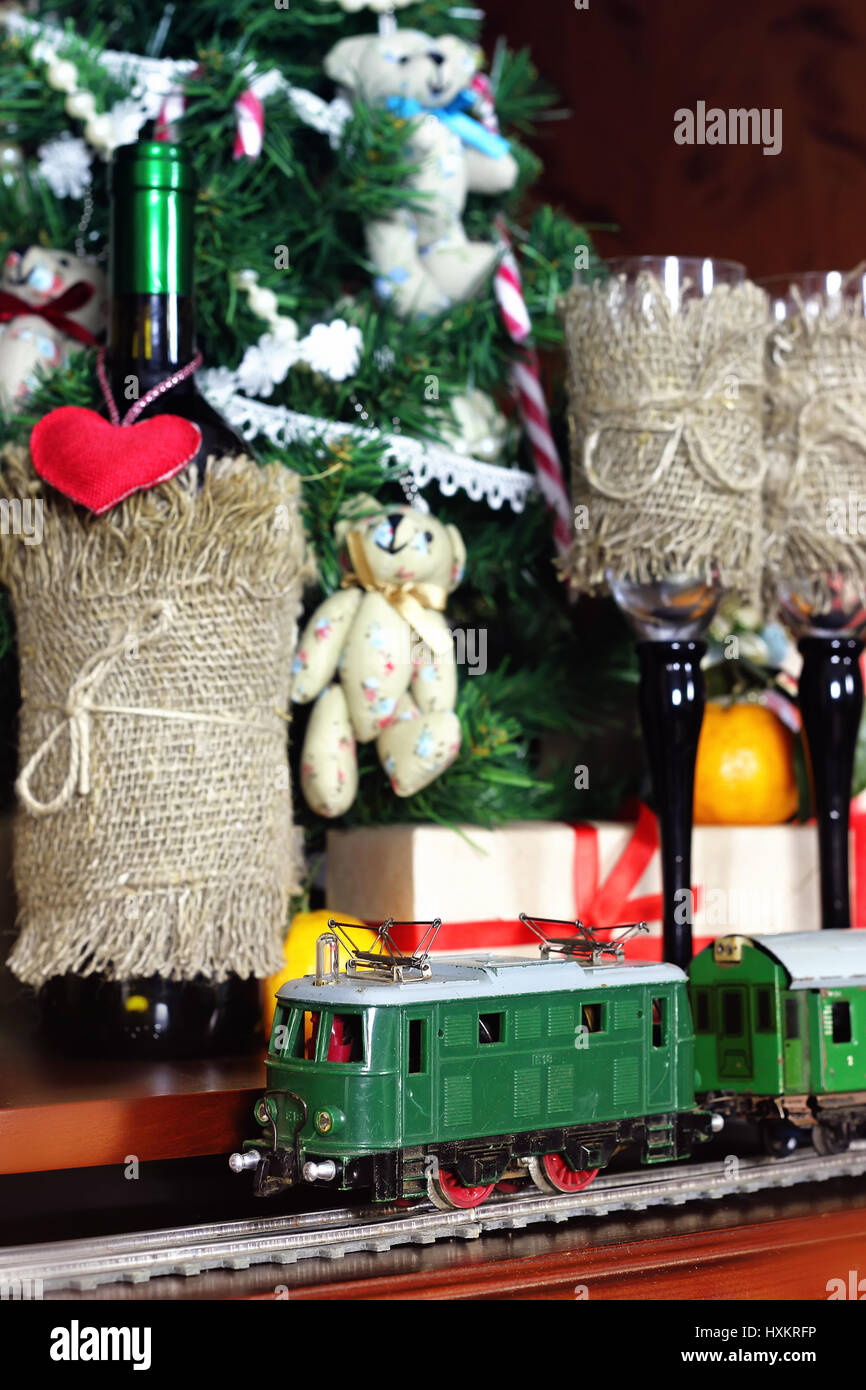 train under tree gift Stock Photo - Alamy