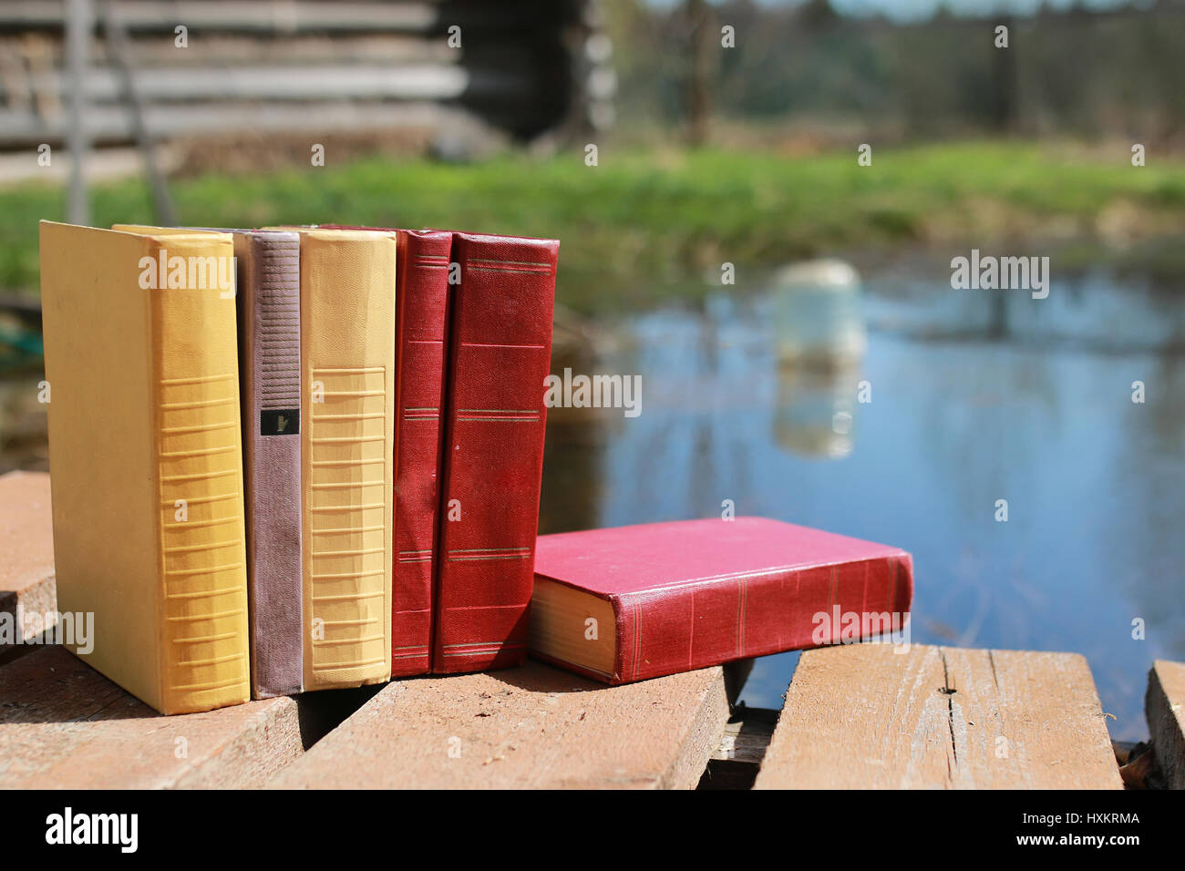 books standing on a table Stock Photo - Alamy