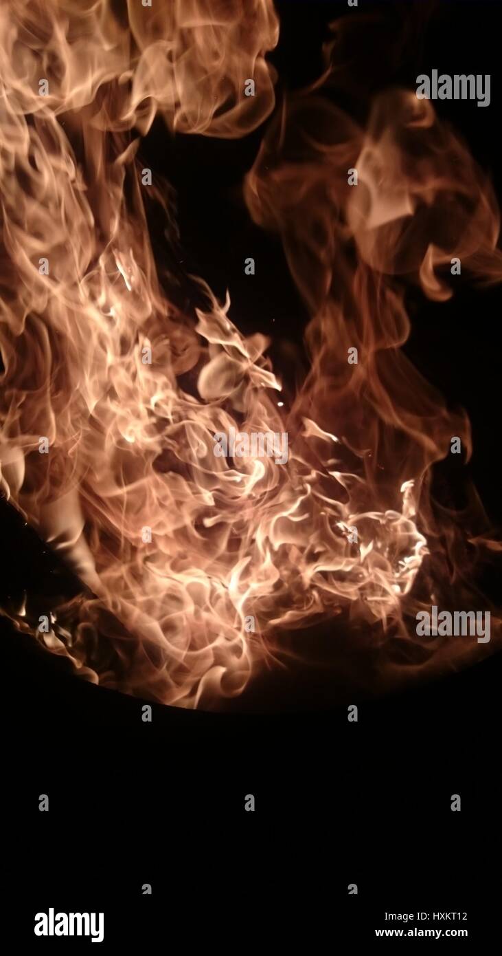 Controlled fire for a BBQ Stock Photo - Alamy
