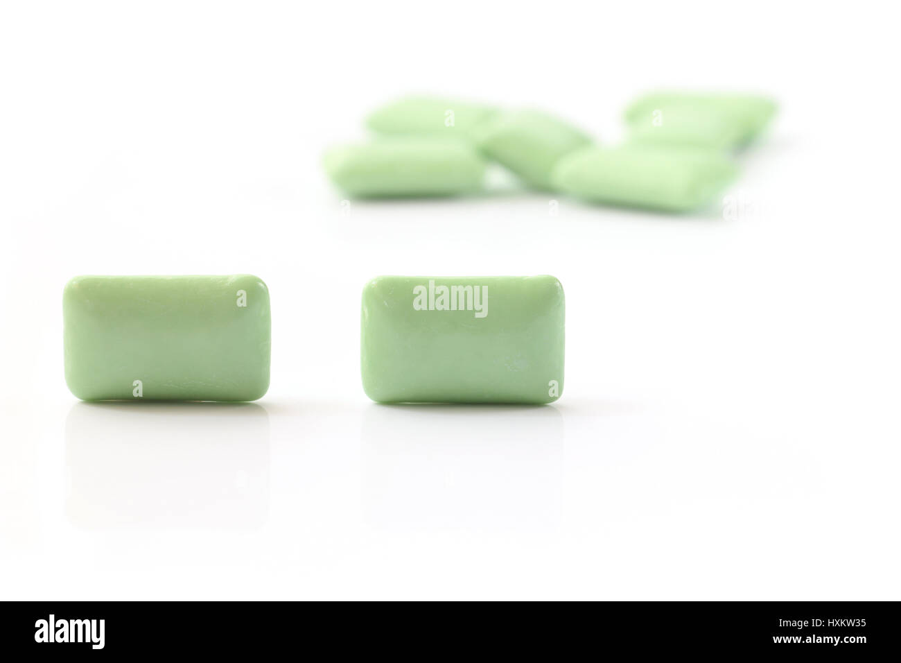 green mint chewing gum tablet on white Stock Photo - Alamy