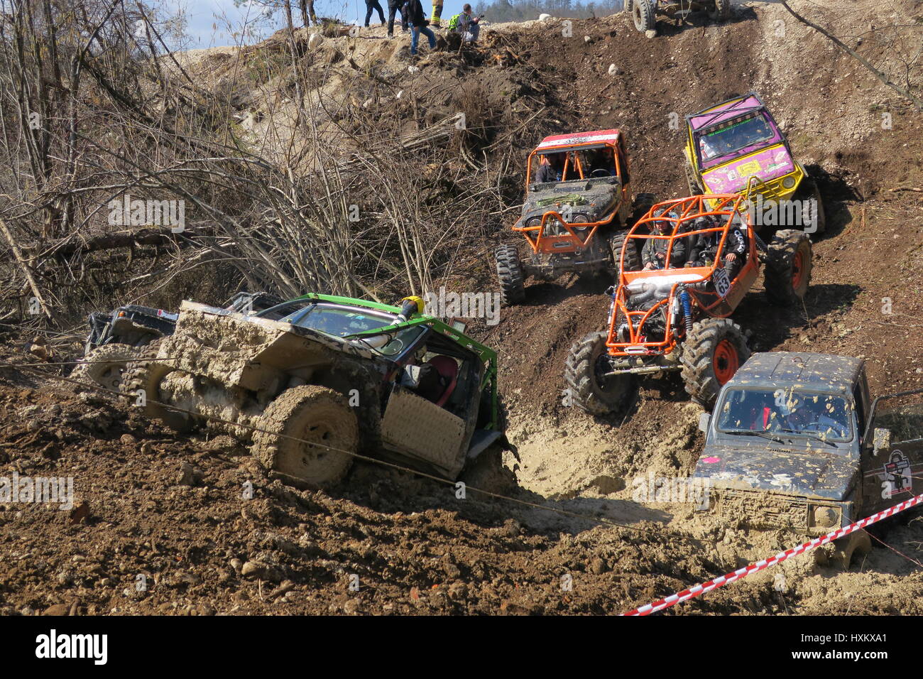 Three off-road cars got stuck in a muddy trench, steel wire at ...