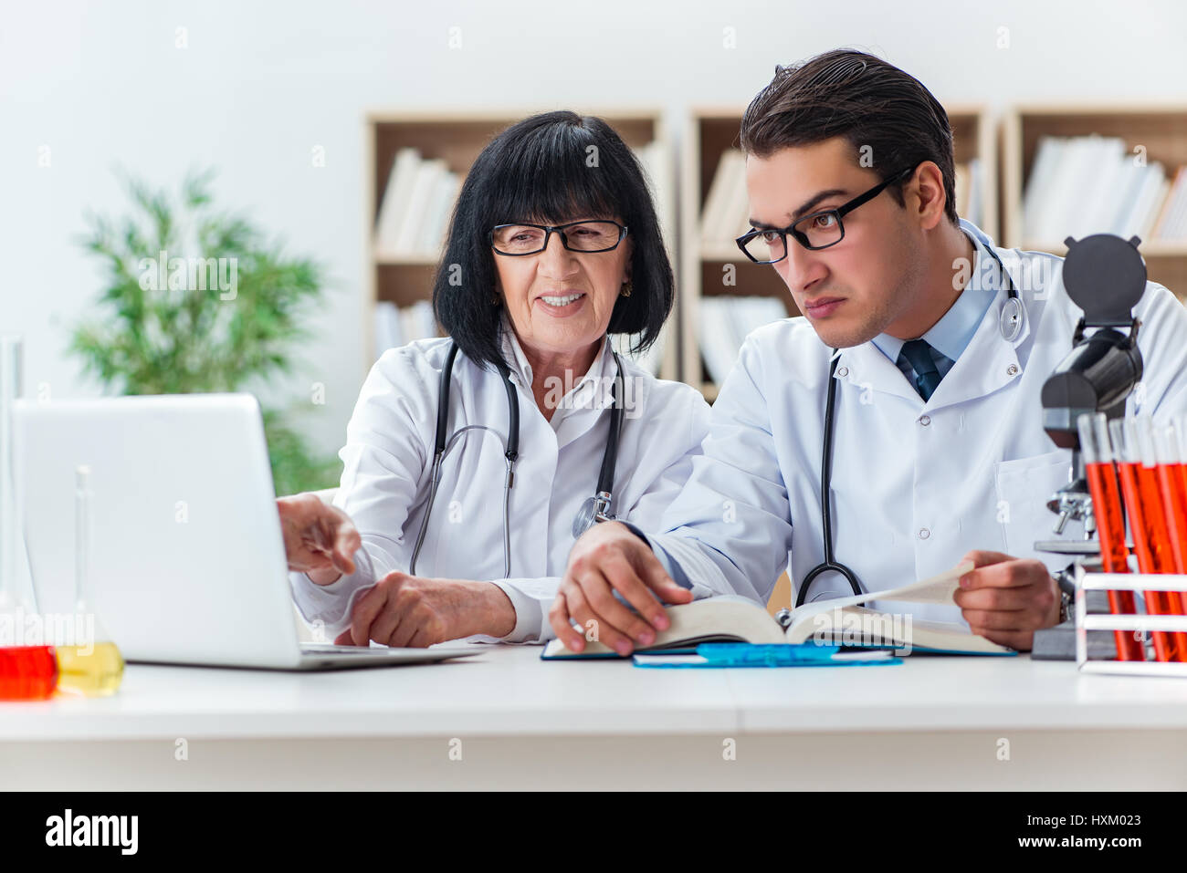 Two doctors working in the lab Stock Photo - Alamy