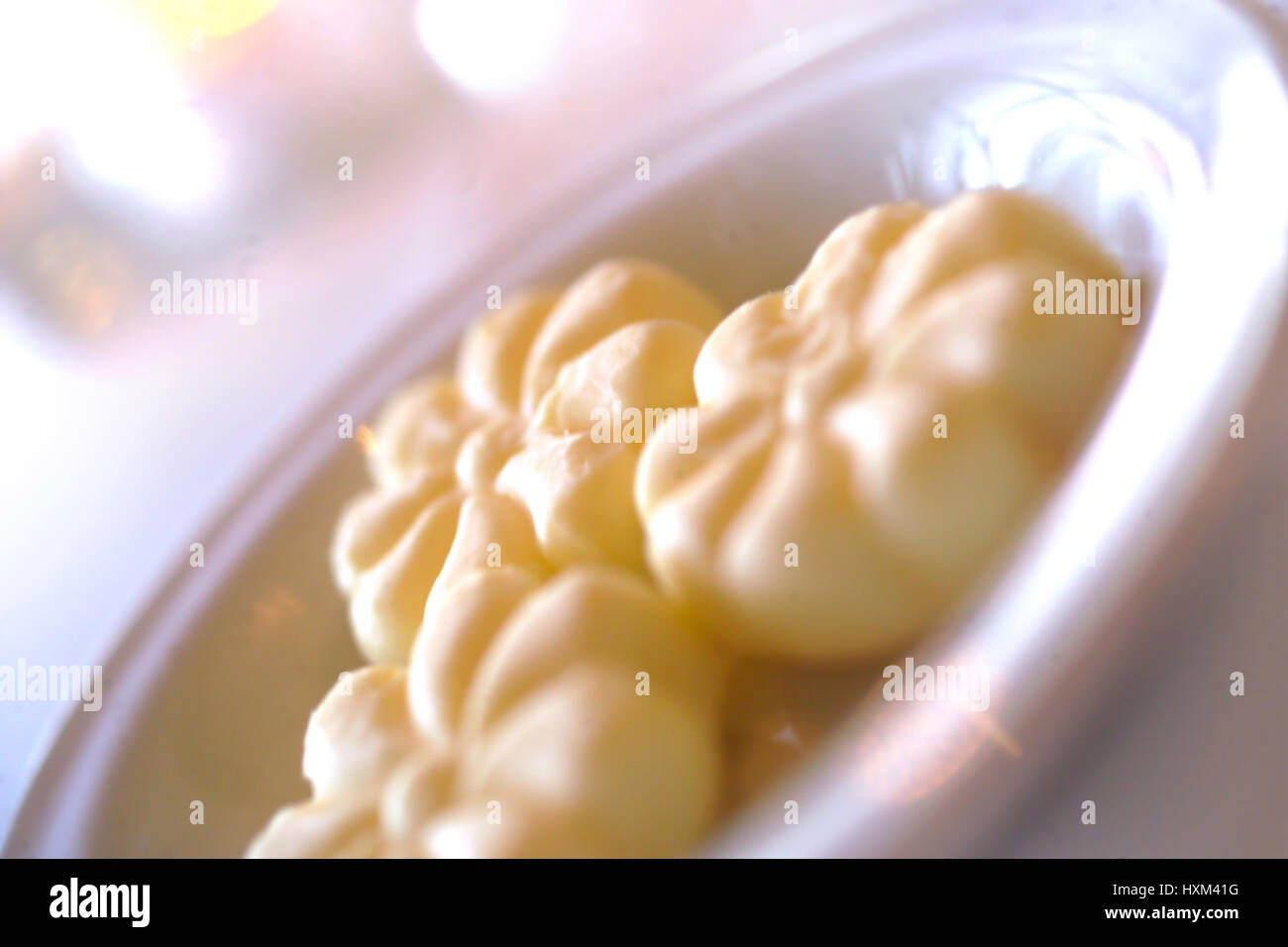 Butter dish/ Pats of butter in a restaurant Stock Photo - Alamy
