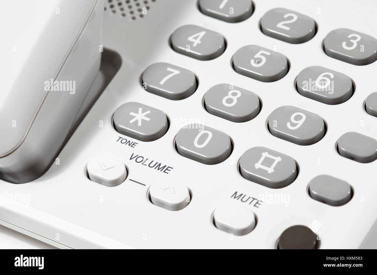 Close up of volume buttons on a landline phone Stock Photo - Alamy