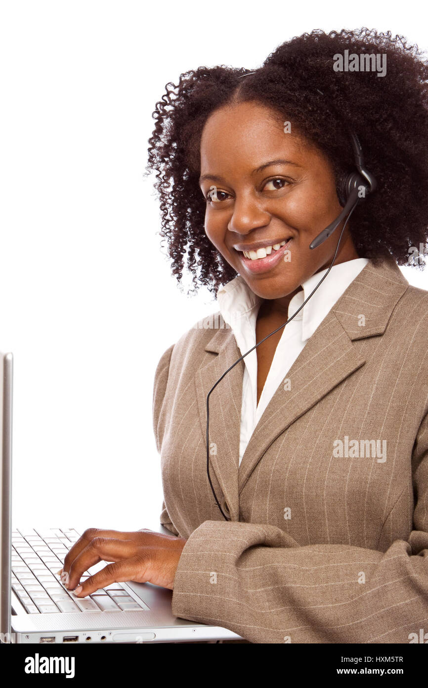 Happy African American customer service agent on the phone Stock Photo ...