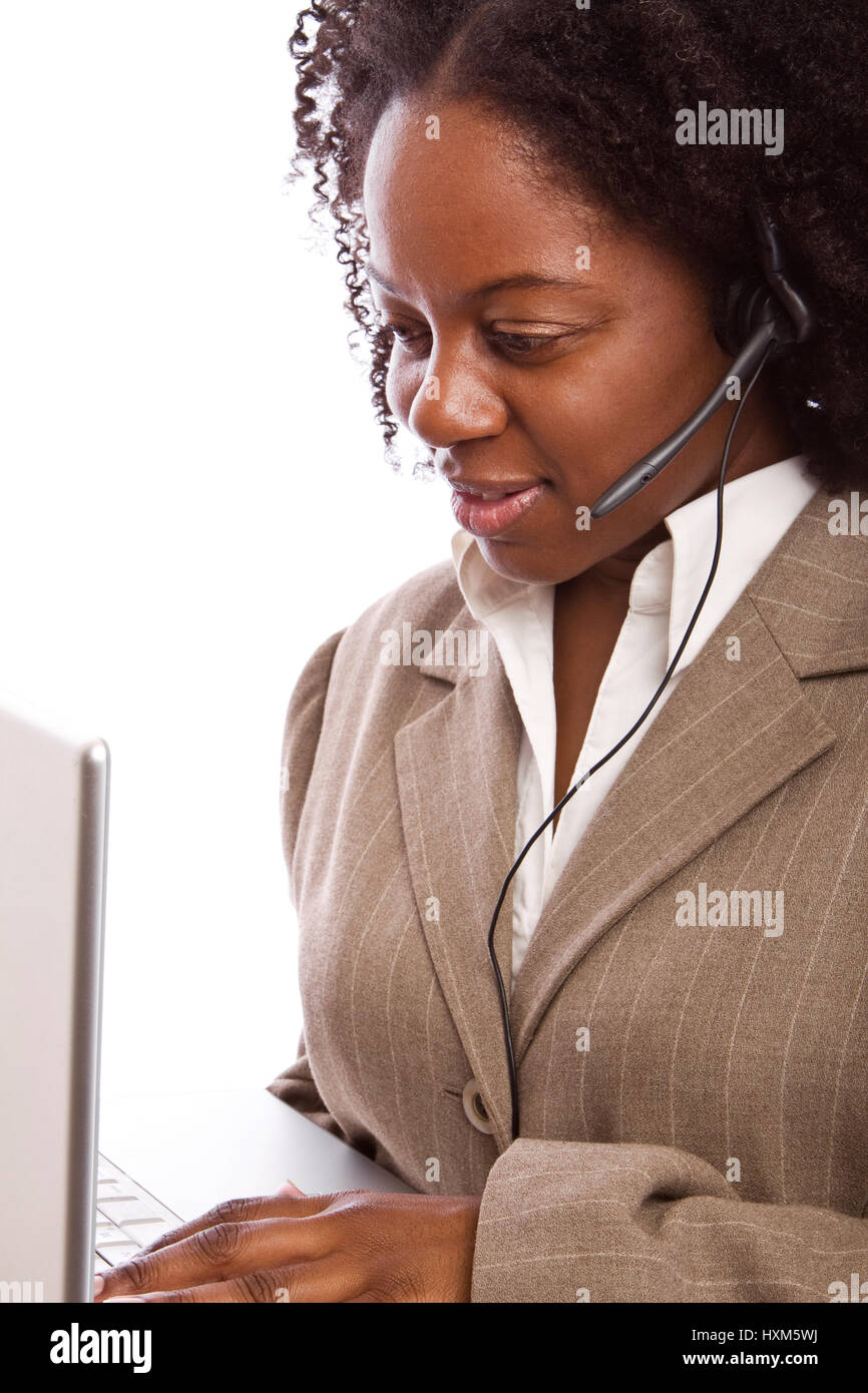Happy African American customer service agent on the phone Stock Photo ...