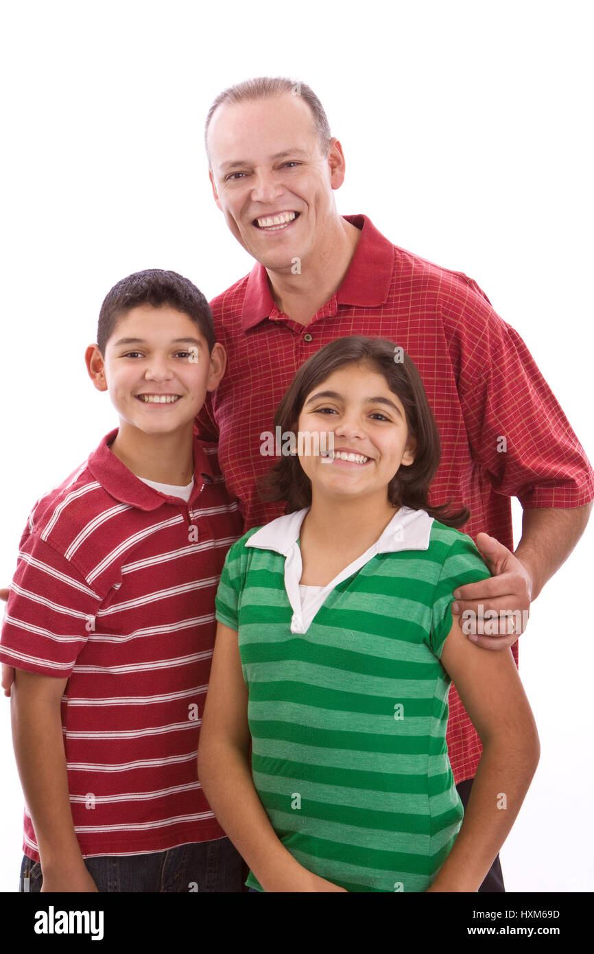 Hispanic father hugging his son and daughter Stock Photo - Alamy