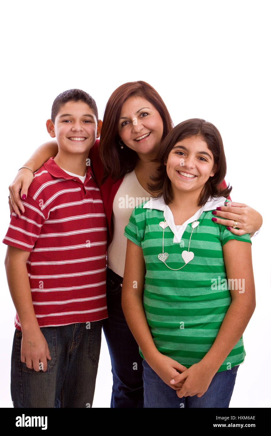 Happy Hispanic mother and her children smiling Stock Photo - Alamy