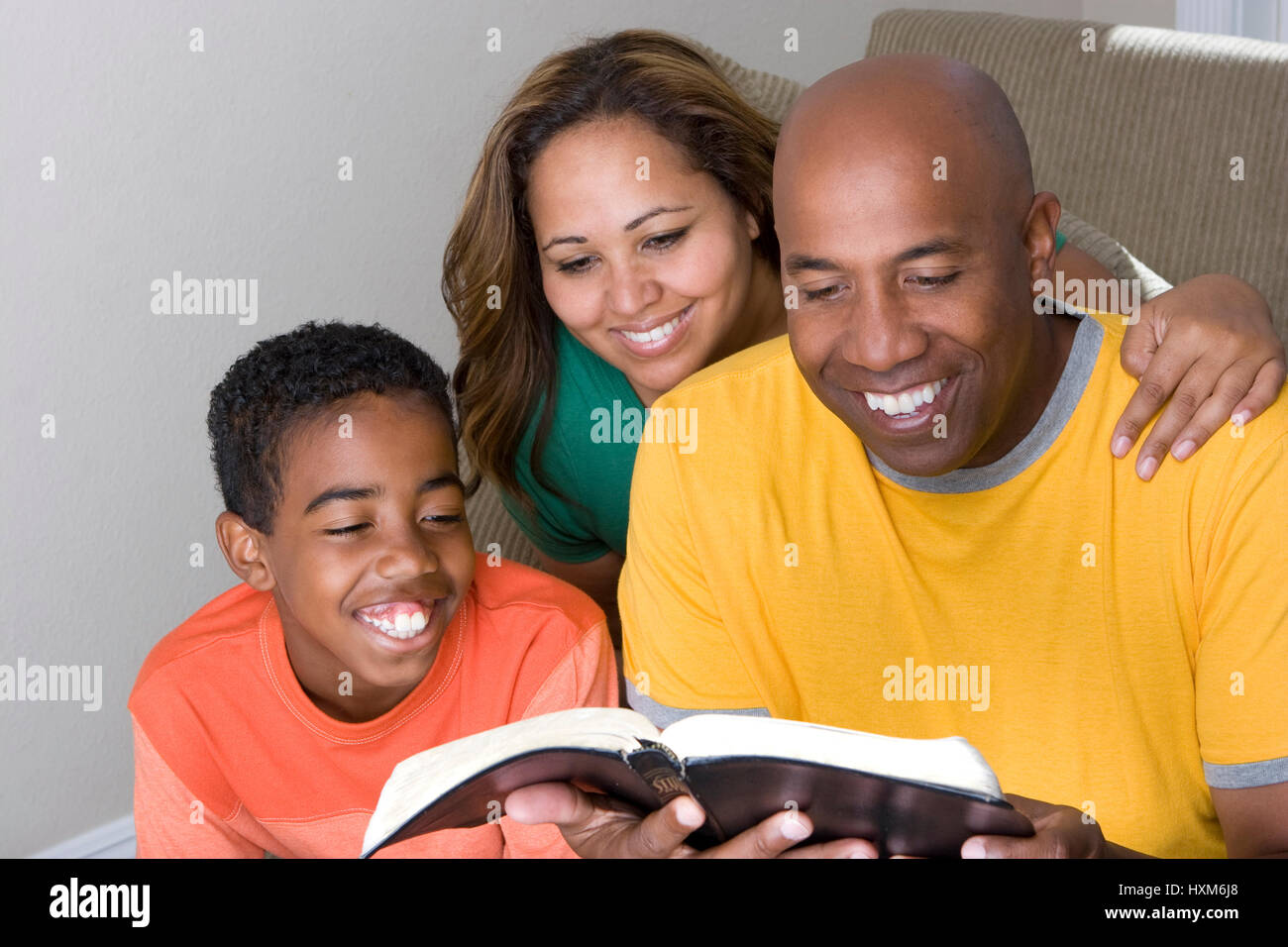 African american child reading bible hi-res stock photography and ...