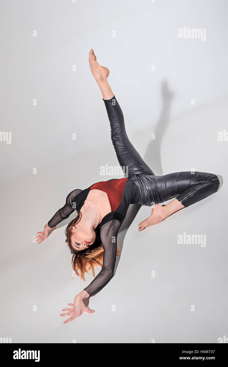 The woman dancing on gray Stock Photo - Alamy